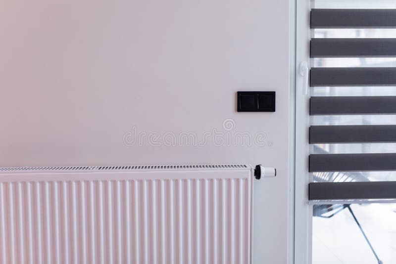 White Radiator with Temperature Control Valve. Central Heating Battery ...