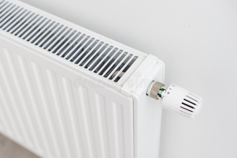 White Radiator with Temperature Control Valve. Central Heating Battery ...