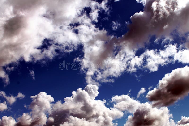 White Rain Clouds on a Dark Blue Sky Stock Photo - Image of cloud ...