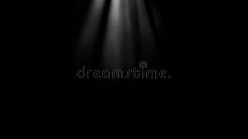 White Rays of Light in Smoke on a Black Background Shine from the Top ...