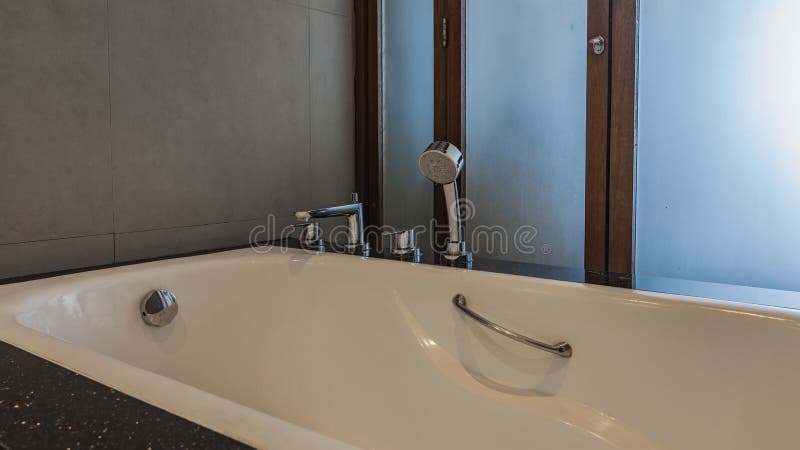 White Rectangular Acrylic Bathtub Metal Handrail Corner Bathroom Stock ...