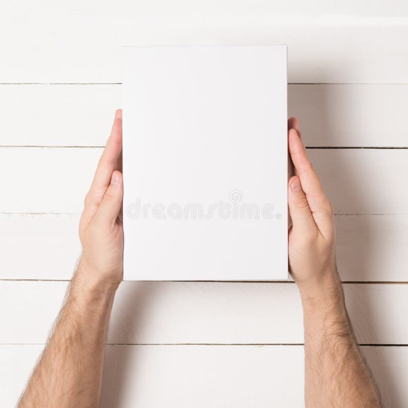 White Rectangular Box in Male Hands. Top View Stock Image - Image of ...