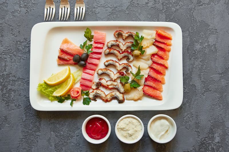 White Rectangular Plate with Smoked and Salted Fish Delicacies Stock ...