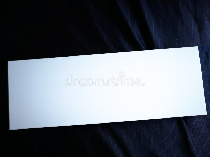 White Rectangular Shaped Board on a Black Background. Stock Photo ...