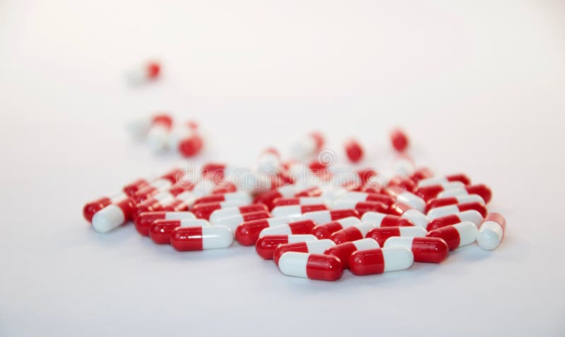 White and red capsules stock image. Image of pain, medication - 145441761