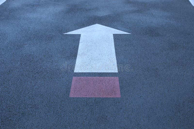 White and Red Direct Arrow on Asphalt Street. Stock Image - Image of ...