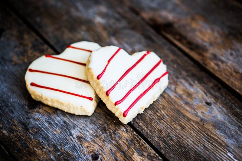White and Red Heart Cookies on Rustic Wooden Background Stock Photo ...