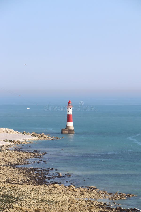 White and Red Lighthouse in the Oceans Stock Image - Image of ...