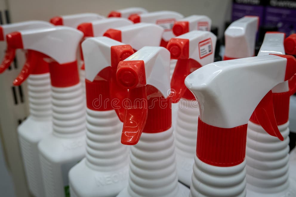 White and Red Plastic Sprayers in a Store Stock Photo - Image of ...
