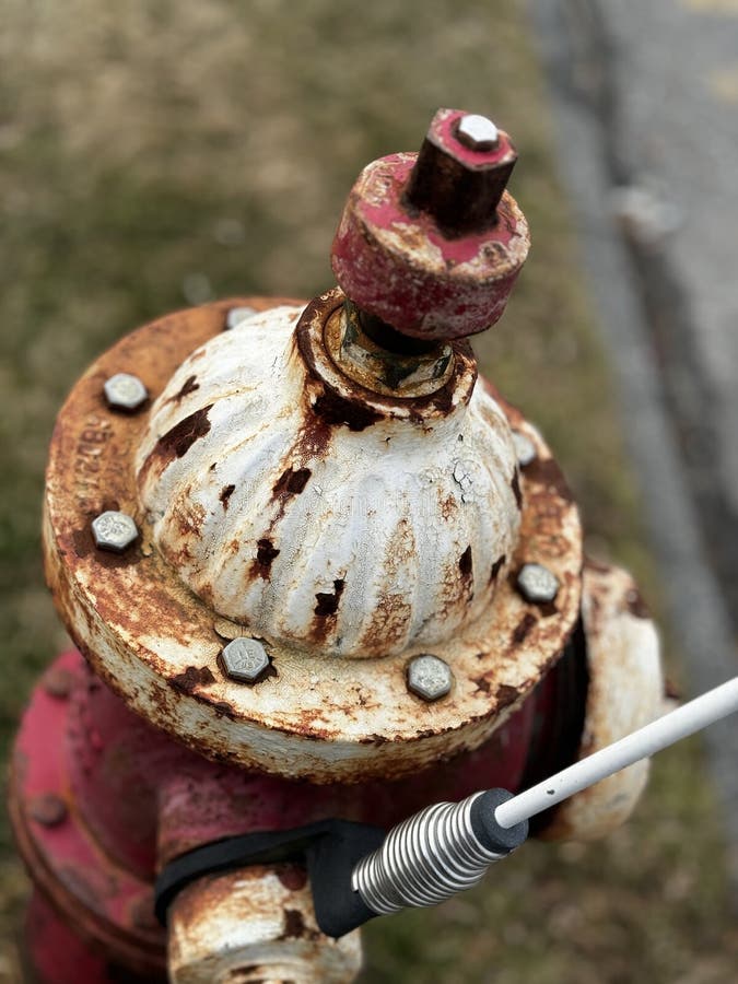 Rusty Red Fire Hydrant Looking Down Stock Photo - Image of still ...