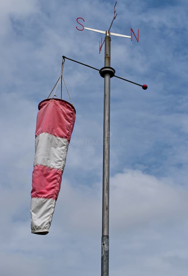 White and Red Windsock Isolated on Blue Sky Background. Check the Wind ...