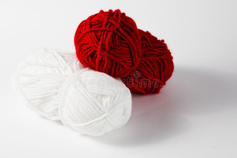 White and red wool ball. stock photo. Image of ball - 141396358