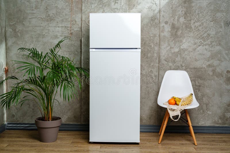 White Refrigerator Against Concrete Wall Stock Image - Image of food ...