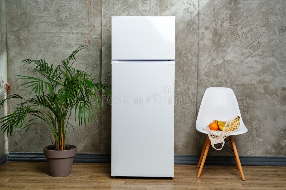 White Refrigerator Against Concrete Wall Stock Image - Image of food ...