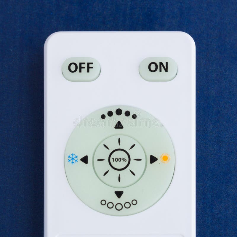 White Remote Control with the Buttons on the Blue Background Stock ...