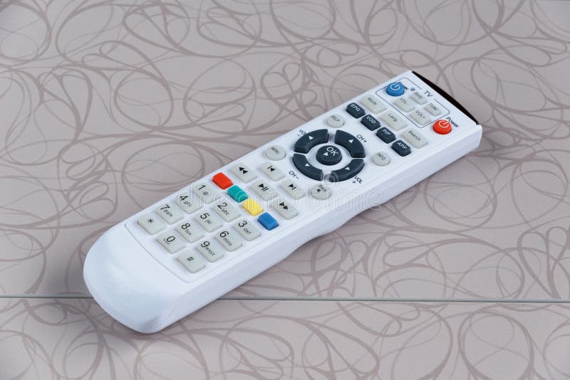 White Remote Control on White Wooden Board. Stock Image - Image of ...