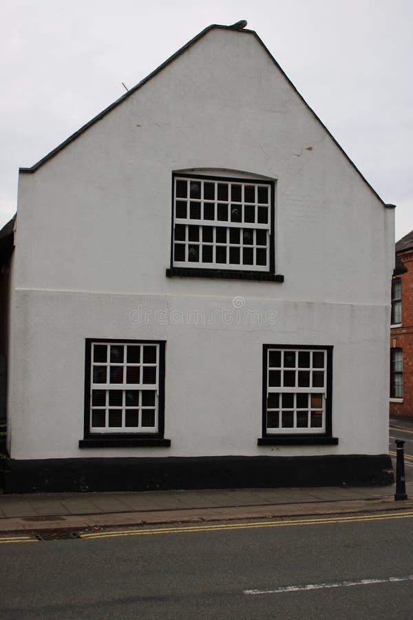 White Rendered Triangular Shaped House UK Stock Image - Image of design ...