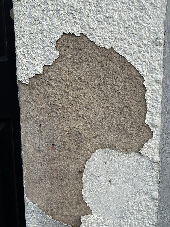 White Rendered Wall with Large Area of Broken Render Stock Image ...