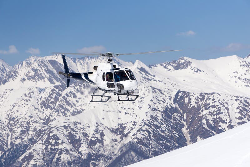 White Rescue Helicopter in the Mountains Stock Image - Image of help ...