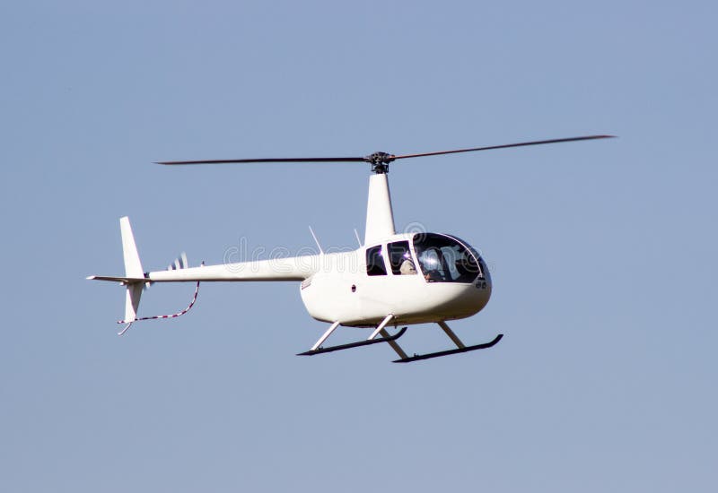 White Rescue Helicopter Moving in Blue Sky Stock Image - Image of blue ...