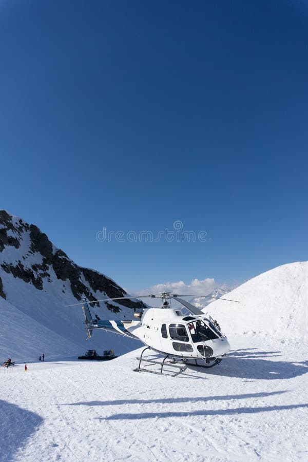 White Rescue Helicopter Parked in the Mountains Stock Image - Image of ...