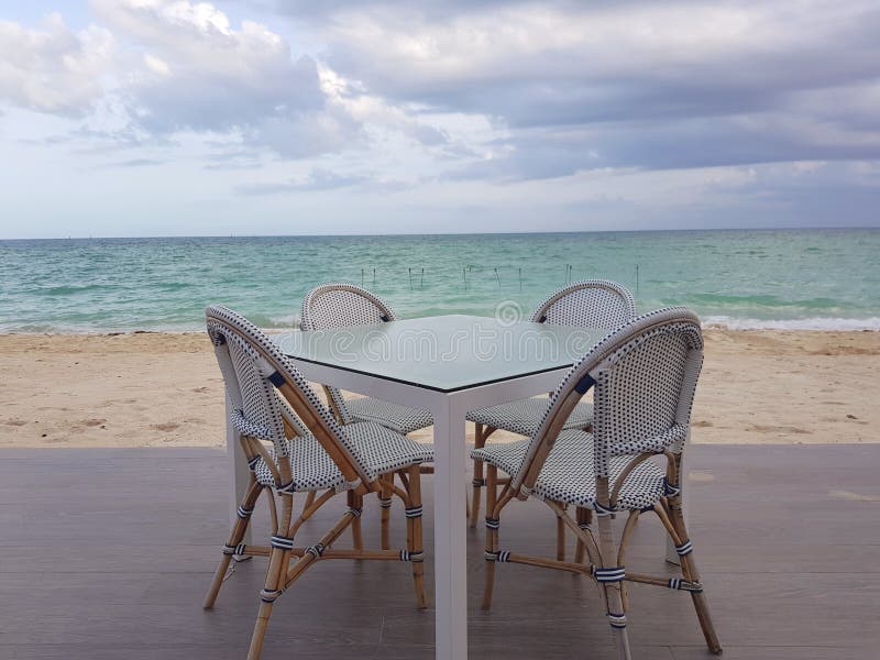 White Restaurant Bar Table and Chairs Near the Beach in Bahamas Stock ...