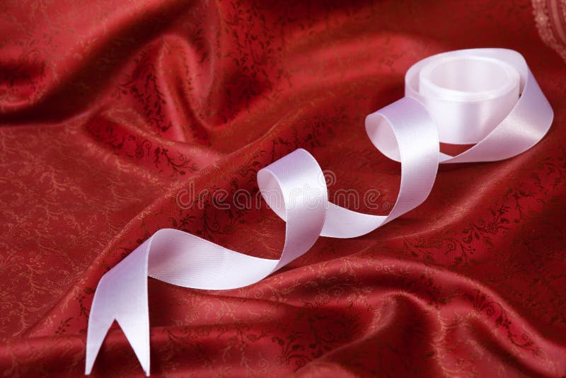 White ribbon on red drape stock image. Image of ornament - 23782921