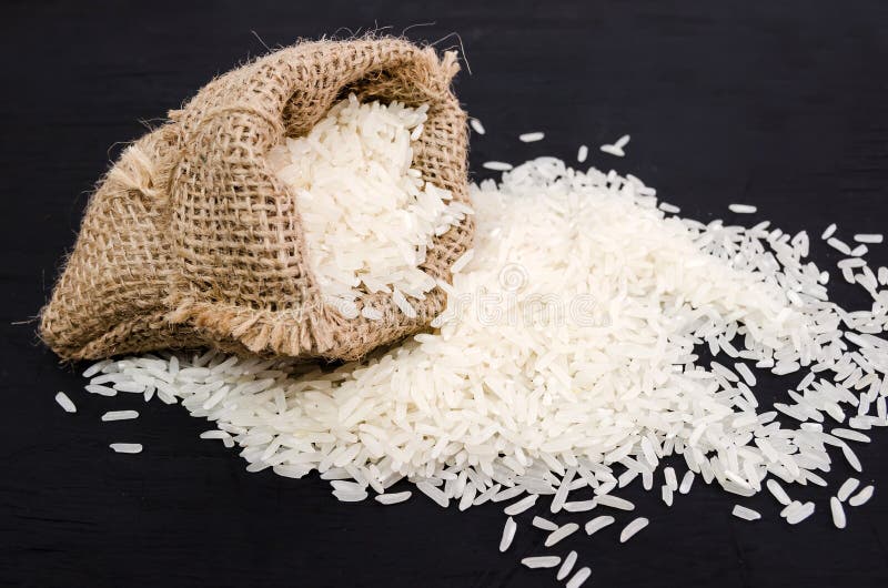 White Rice in a Bag on a Black Background. Stock Photo - Image of white ...