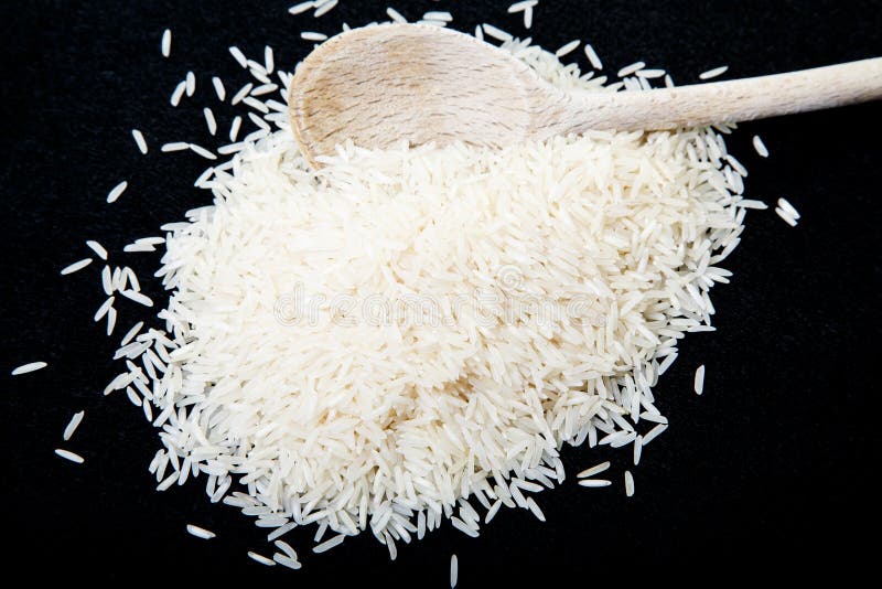 White Rice on Black Background Stock Image - Image of grains, rice ...