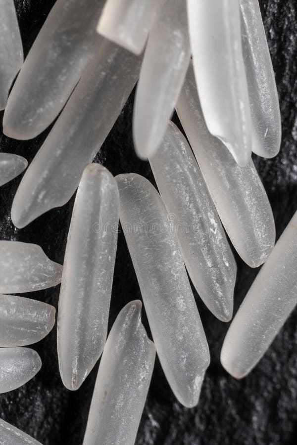 White Rice on a Black Graphite Stone Slab Stock Photo - Image of farm ...