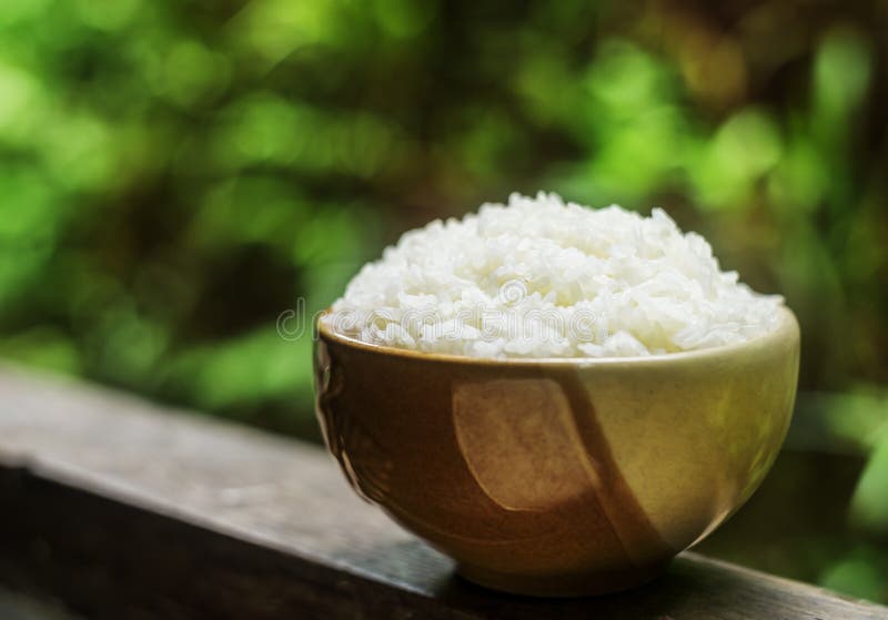 White Rice in Brown Bowl on Wooden Stock Image - Image of wooden ...