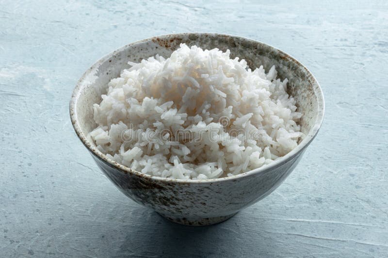 White Rice, Cooked. a Bowl of Boiled Long Grain Rice Stock Image ...