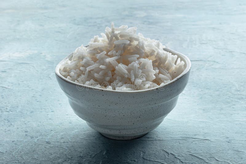 White Rice, Cooked. a Bowl of Boiled Long Grain Rice Stock Photo ...