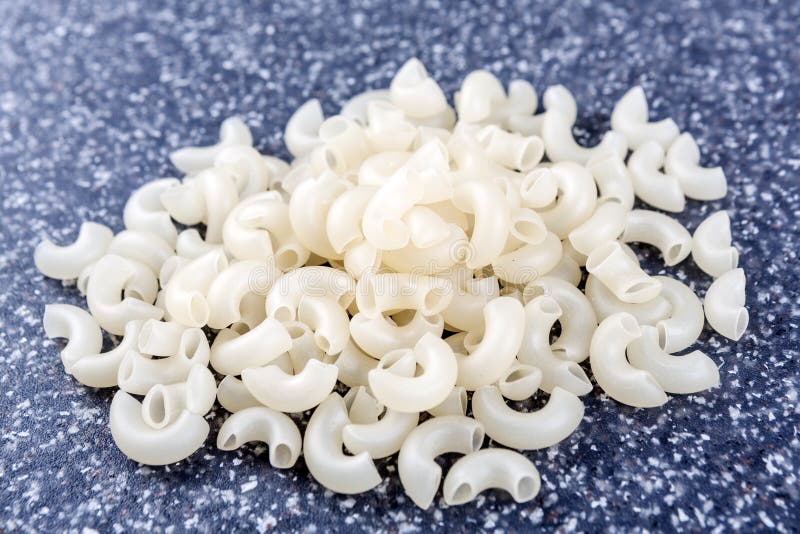 White rice elbow macaroni stock image. Image of food - 83175447