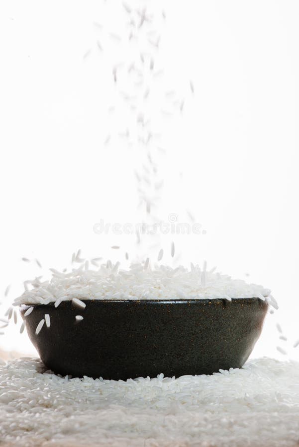White Rice Falling Down. Jasmine Rice, Thai Rice, Raw Rice. Stock Photo ...
