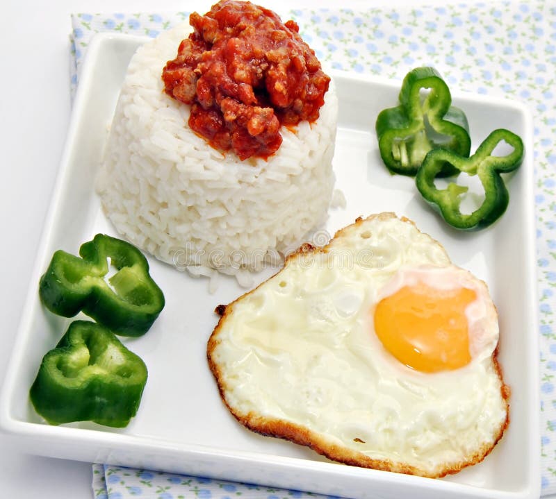 White rice with fried egg stock image. Image of calories - 20461491