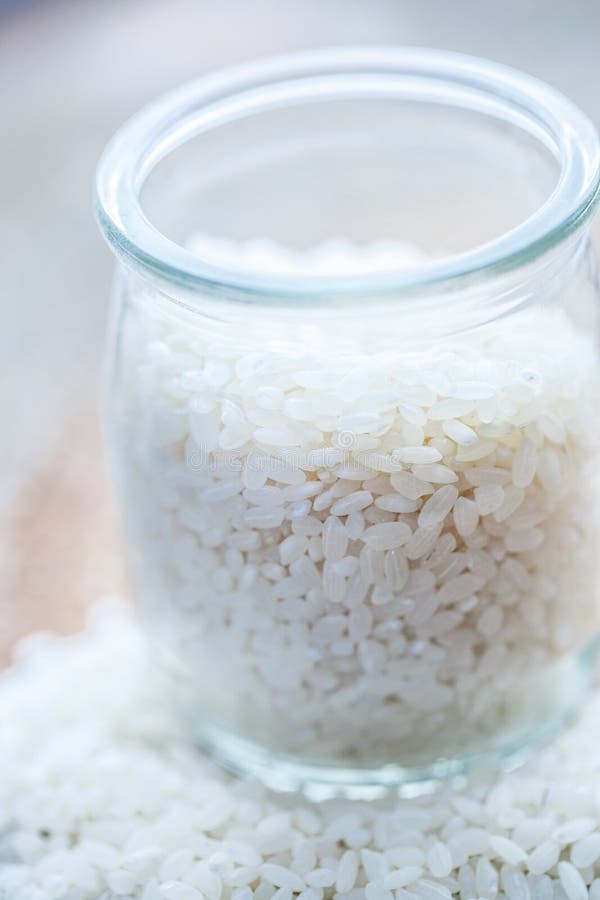 White Rice in a Glass Jar on the Table Stock Image - Image of asian ...