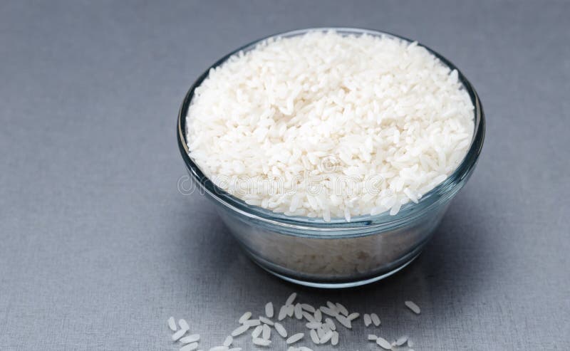 White rice measured in cup stock image. Image of grain - 60026499