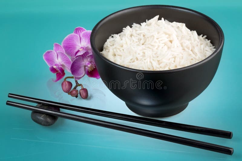White Rice, Orchid and Chopsticks Stock Image - Image of fiber, boiled ...