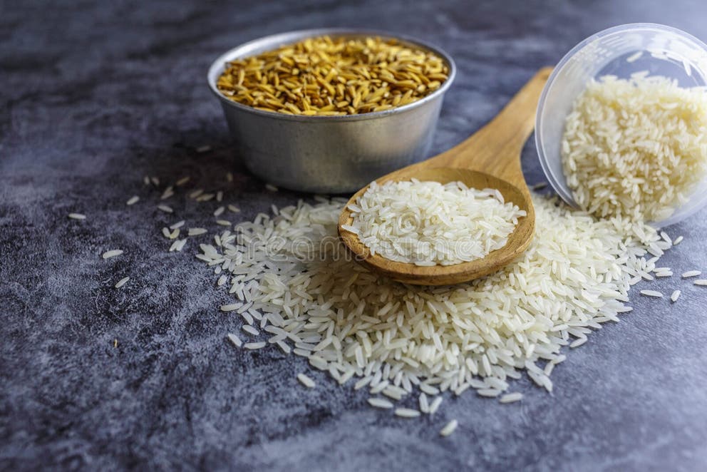 White Rice and Paddy on the Table Stock Photo - Image of paddy, fiber ...