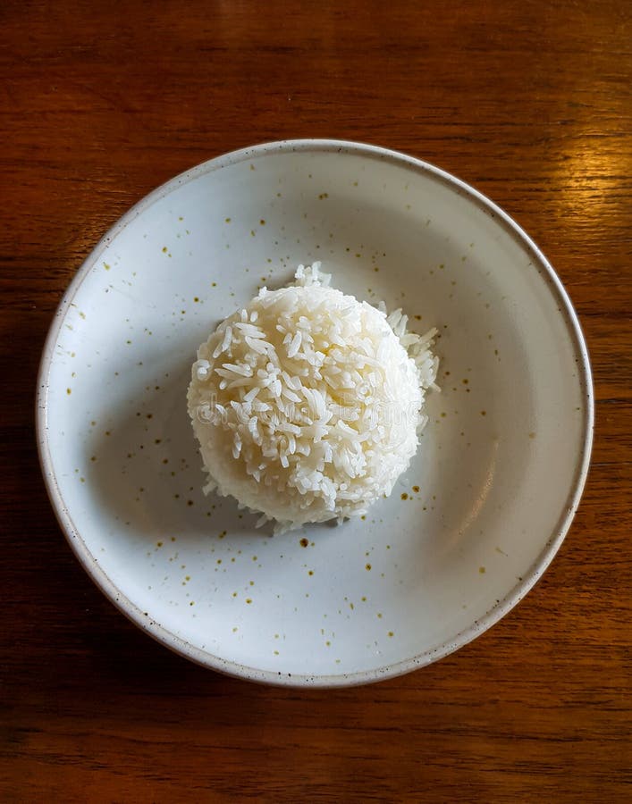 White rice on the plate stock image. Image of cuisine - 196194693