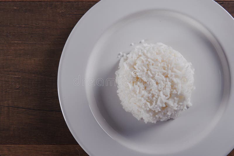 White Rice in Plate on Wooden Table Stock Image - Image of dinner, rice ...