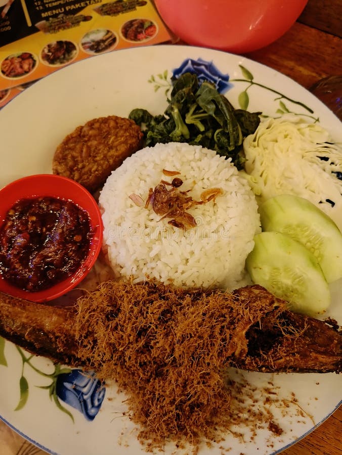 White Rice with Red Chili Sauce and Creamy Fried Catfish Stock Photo ...