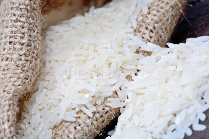 White Rice in a Sack on Table Stock Image - Image of white, canvas ...
