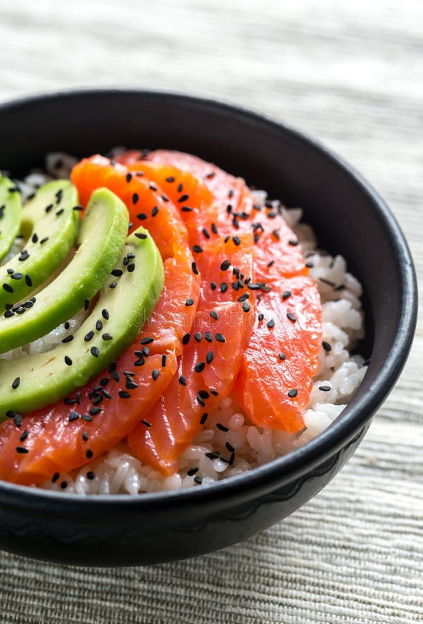 White Rice with Salmon and Avocado Stock Photo - Image of bowl, cuisine ...