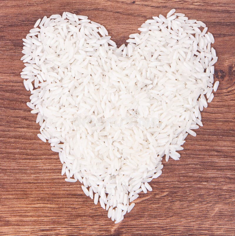 White Rice in Shape of Heart on Rustic Board, Healthy Nutrition Stock ...