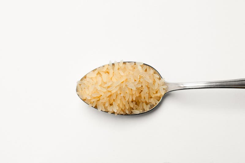 White rice and spoon stock image. Image of healt, ingredient - 16914637