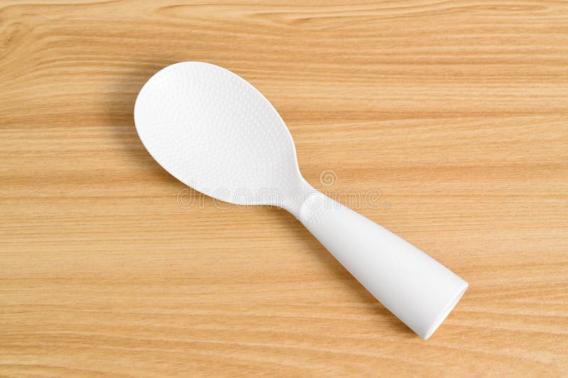White Rice Spoon or Rice Ladle on Wooden Table Stock Image - Image of ...