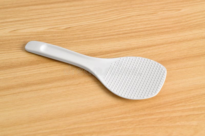 White Rice Spoon or Rice Ladle on Wooden Table Stock Image - Image of ...