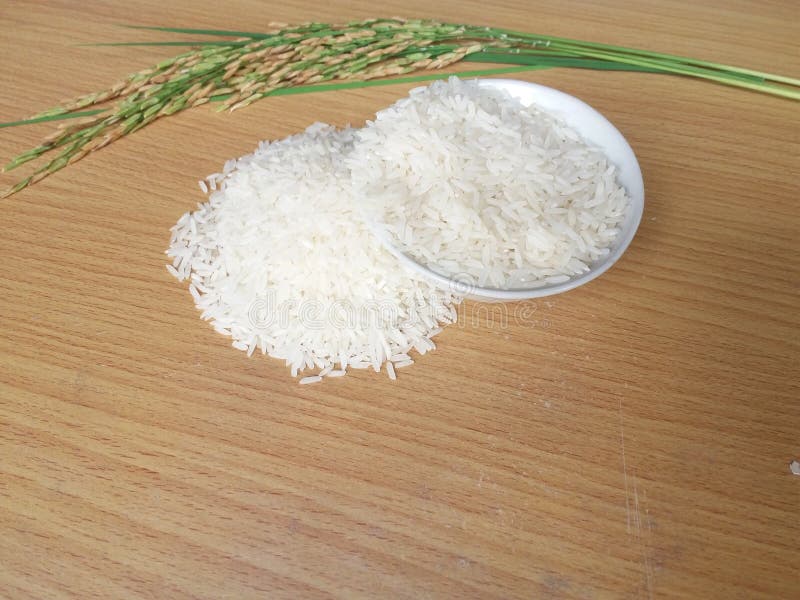 White Rice on the Wood Black Ground Stock Image - Image of wood, white ...